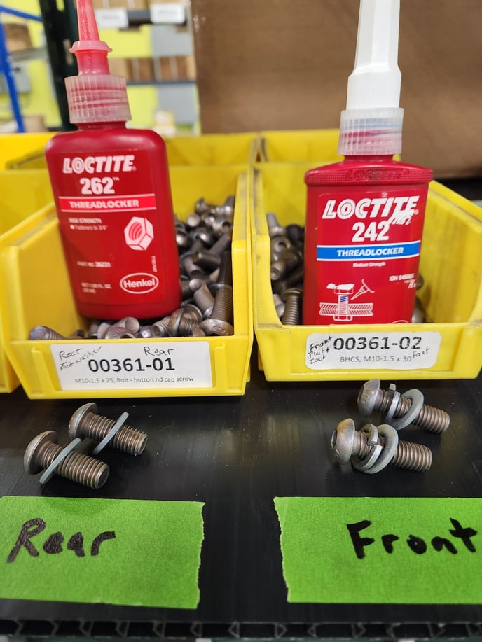 What is the hardware used to attach the pod to the pod rack?